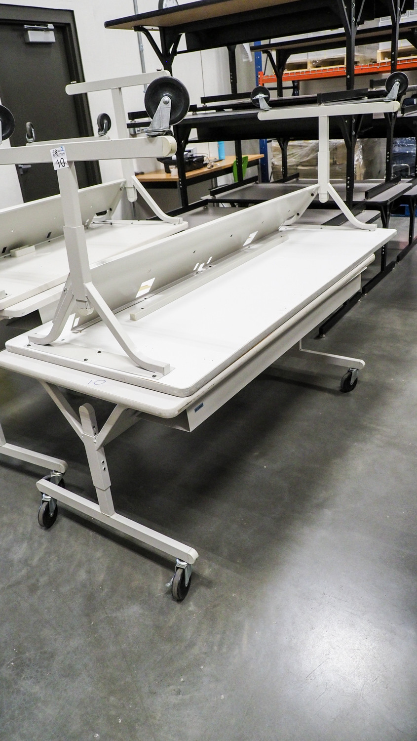 2 white rolling tables - Swico Auctions