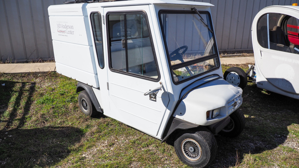 EZ Go golf cart MPT 1000 with refrigerated box - Swico Auctions